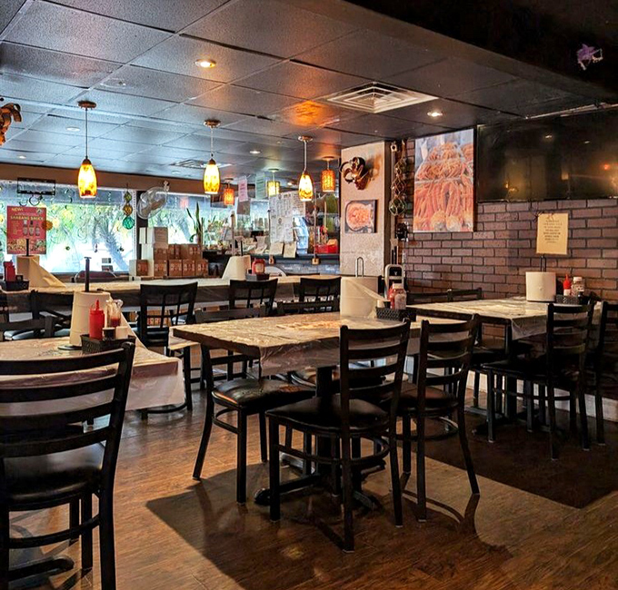 Simple tables covered in paper&mdash;the universal signal that says, "Prepare for deliciousness that requires no pretense, just napkins."