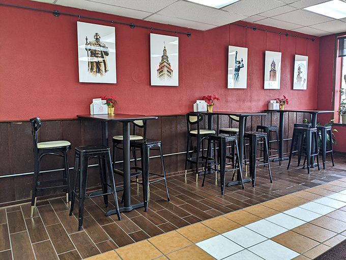 Simple seating with Cleveland landmarks watching over every delicious bite - pure neighborhood deli charm at work.