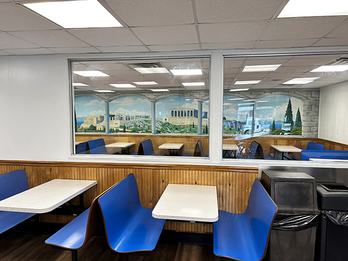 Blue booths and wood paneling&mdash;the classic diner aesthetic that says, "Sit down, stay awhile, and forget about your diet for the next hour."