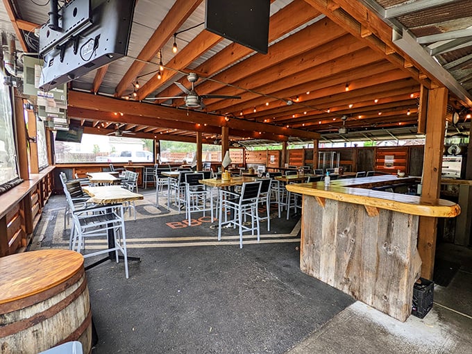 The covered dining area feels like the best backyard party you've ever attended, minus the neighbor who insists on playing his acoustic guitar.