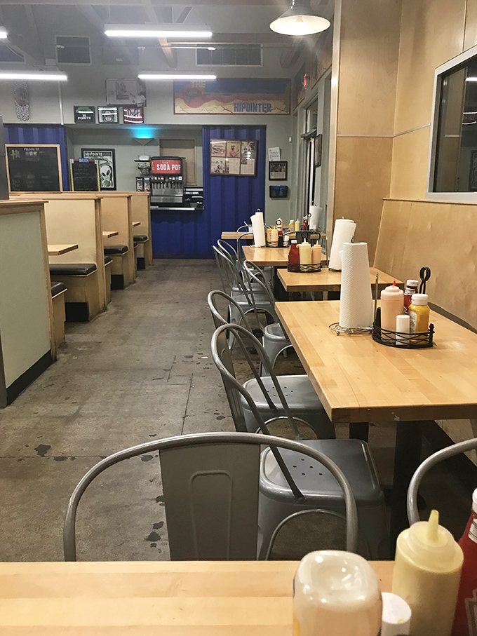 Simple wooden tables and metal chairs create an unpretentious backdrop for serious eating. No distractions from the food here.