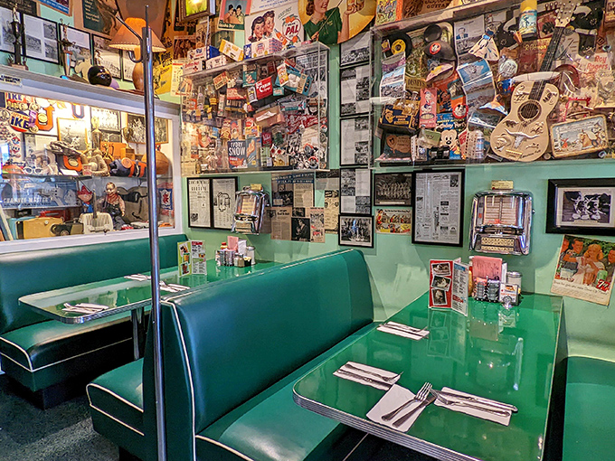 These mint-green booths aren't just seating&mdash;they're front-row tickets to the greatest show on earth: people watching with a side of comfort food.