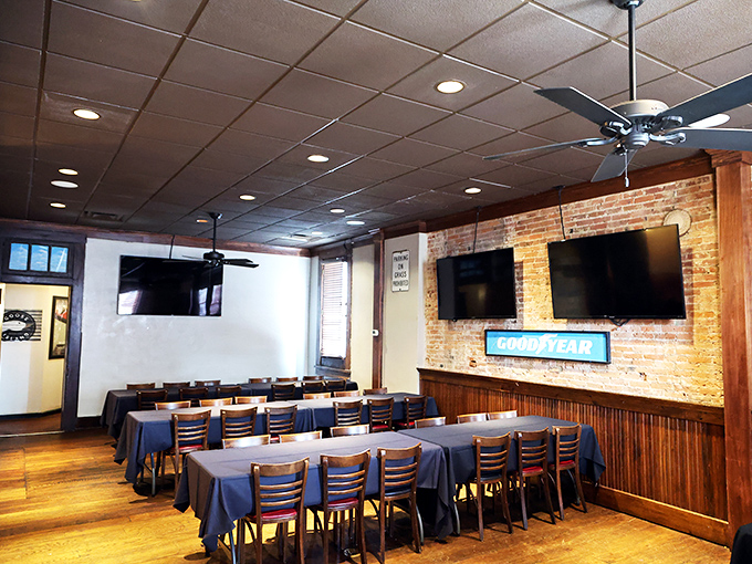 The dining area says "stay awhile" without having to say a word. Those blue tablecloths aren't just decor&mdash;they're invitations to settle in.