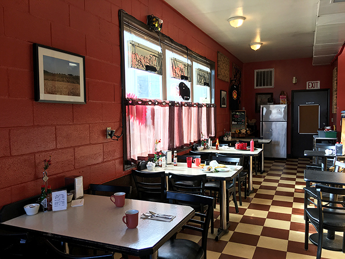 The dining area's no-nonsense charm lets you focus on what matters: the food. Those red coffee mugs are practically Oregon diner royalty.