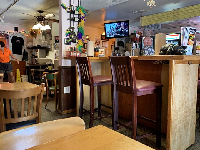 The dining area isn't trying to impress Architectural Digest&mdash;it's designed for the serious business of getting barbecue from plate to face.