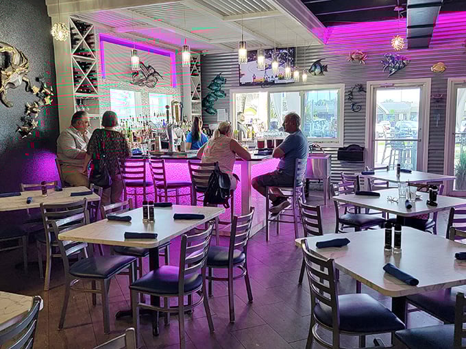 The purple glow isn't just mood lighting &ndash; it's the restaurant's way of saying "seafood this good deserves its own dramatic entrance."