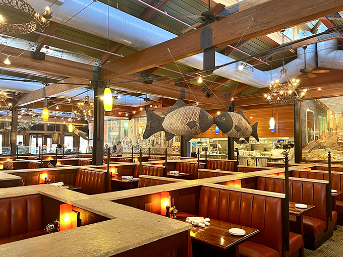 The dining room feels like the world's coziest ship cabin, complete with those giant fish sculptures keeping watch over your meal.