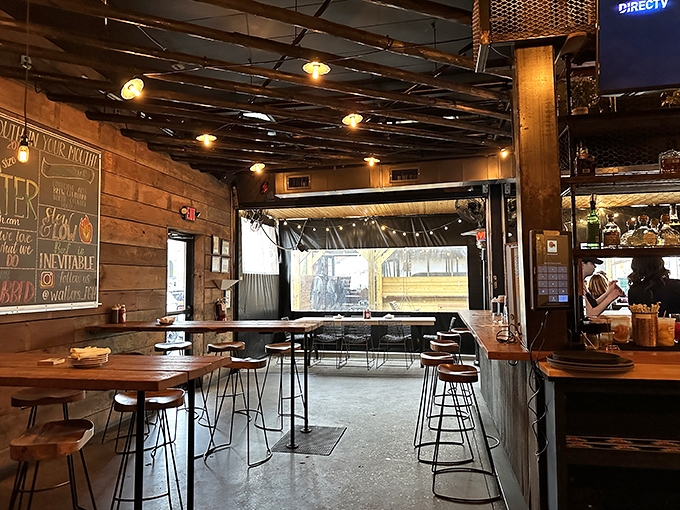 The interior at Walter's speaks the universal language of BBQ joints: wooden walls, simple furnishings, and an atmosphere that says "focus on the food."