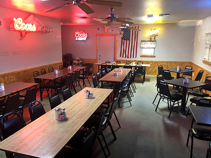 The dining room waits patiently for the lunch rush, like a theater before the show. Those neon beer signs aren't decoration&mdash;they're beacons of hope.