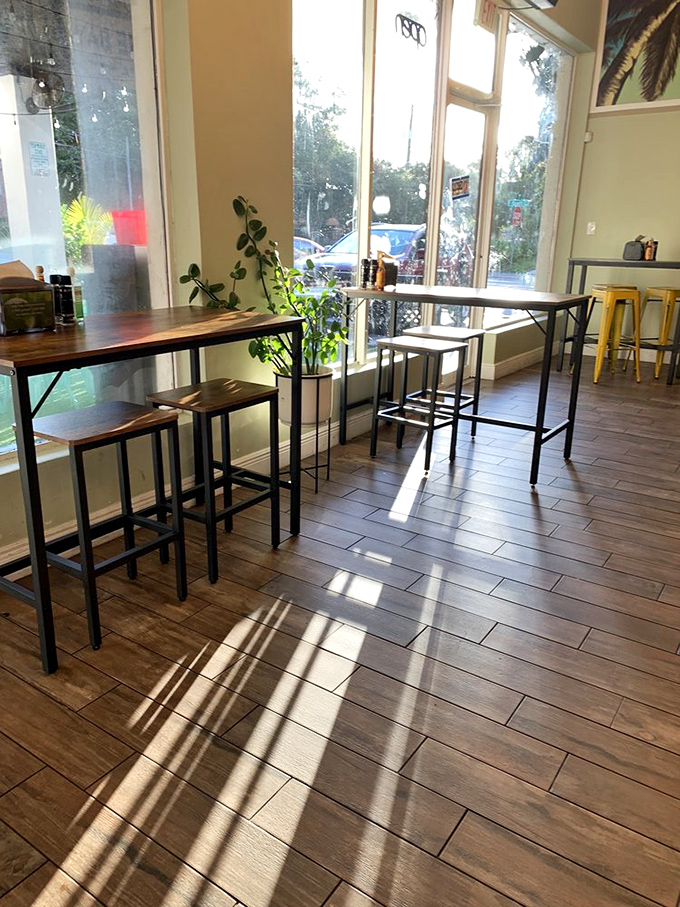 Sunlight streams through floor-to-ceiling windows, creating the perfect spot to linger over lunch or pretend to work on your novel.
