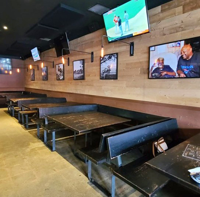 The dining area's wood-paneled walls and bench seating say, "Stay awhile, get comfortable, and prepare for a serious meat meditation."