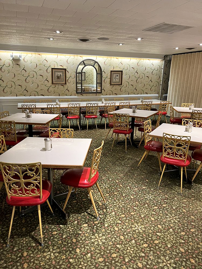 The dining room's vintage charm feels like a warm hug &ndash; those filigree chairs and patterned carpet have witnessed decades of satisfied sighs.