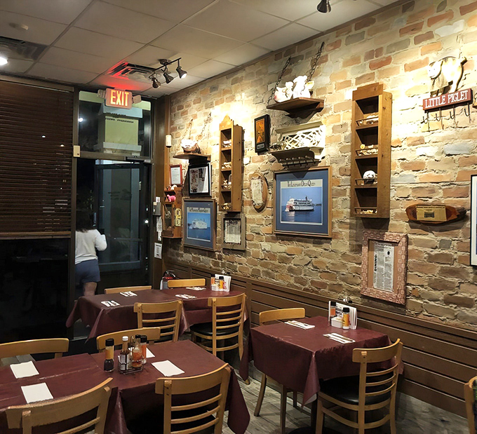 Exposed brick walls and riverboat memorabilia create the perfect backdrop for your barbecue adventure ahead.