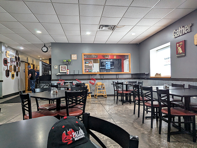 Where pizza dreams come true. Simple tables, comfortable chairs, and the promise of deliciousness hanging in the air.