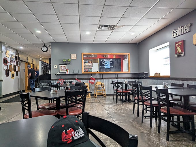 Where pizza dreams come true. Simple tables, comfortable chairs, and the promise of deliciousness hanging in the air.