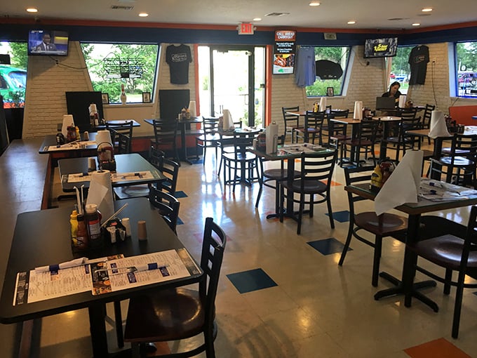 A dining room where strangers become friends over shared appreciation of smoke rings and sauce choices.