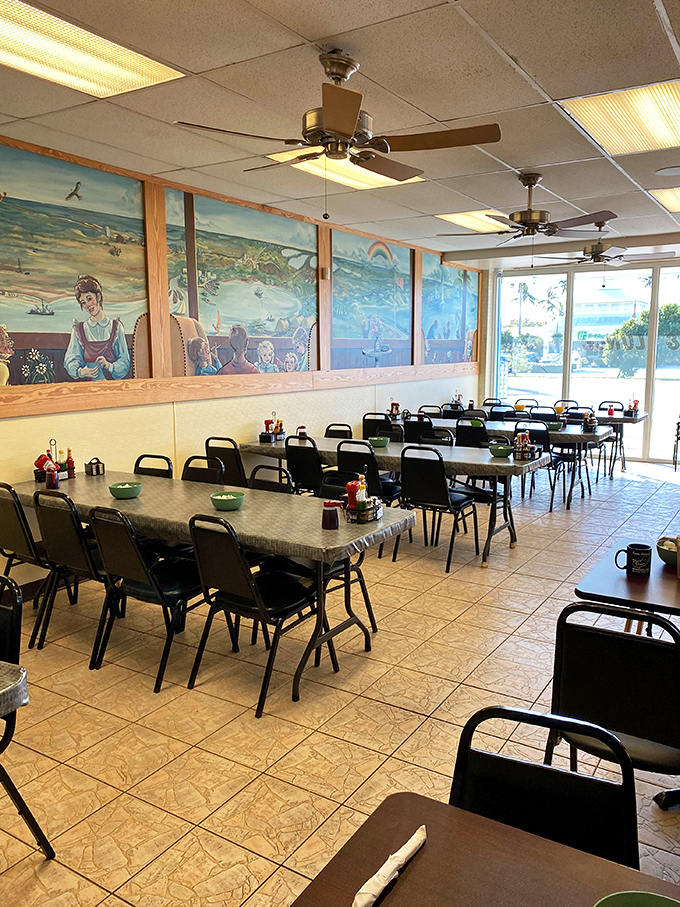 Colorful Keys-inspired murals watch over diners like old friends. The ceiling fans keep the conversation flowing as easily as the coffee.