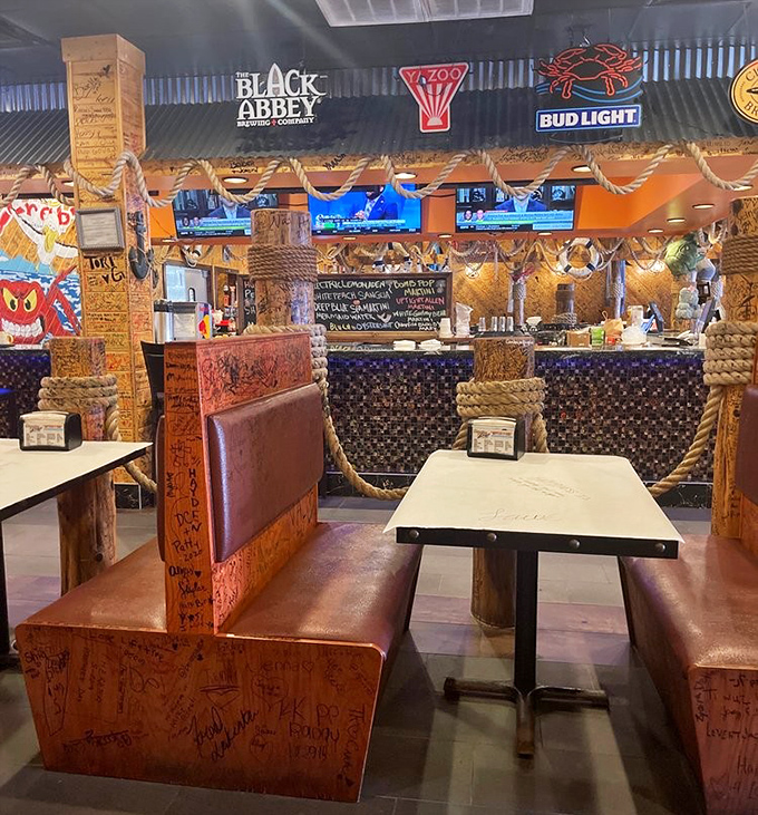 The dining booths tell stories through years of signatures. Each wooden surface is a guestbook of satisfied, butter-stained memories.
