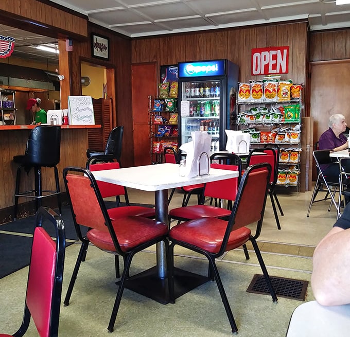 Red chairs, white tables, and wood paneling—the classic sub shop trinity. Some dining rooms don't need to be fancy to feel like home.