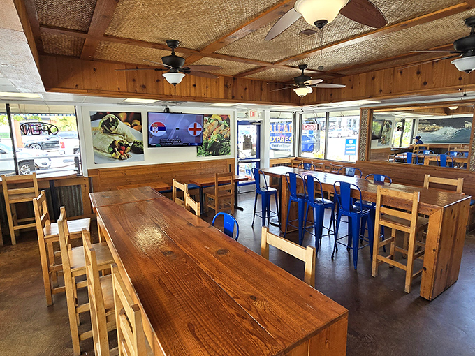 The dining area balances rustic charm with practicality&mdash;wooden tables that have hosted thousands of burrito-induced moments of bliss.