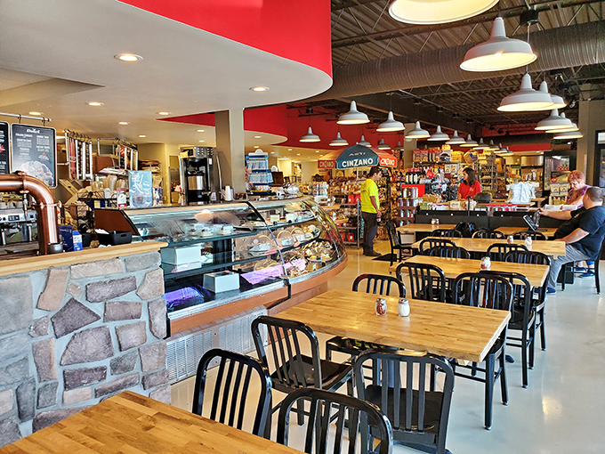 The dining area where strangers become friends over shared appreciation of proper Italian food. Notice nobody's looking at their phones&mdash;the food demands full attention.