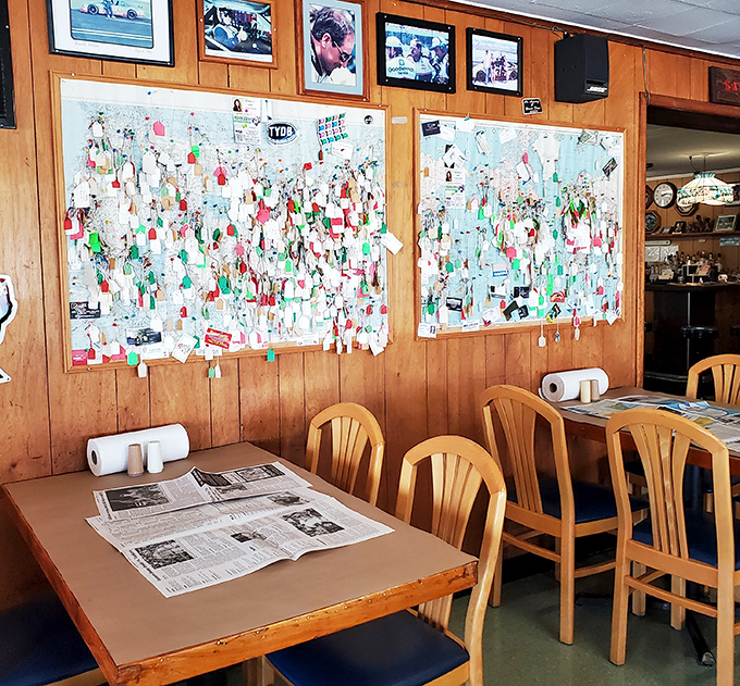 Wood-paneled walls covered with memorabilia tell stories of decades past, while those bulletin boards hold the memories of countless satisfied diners.