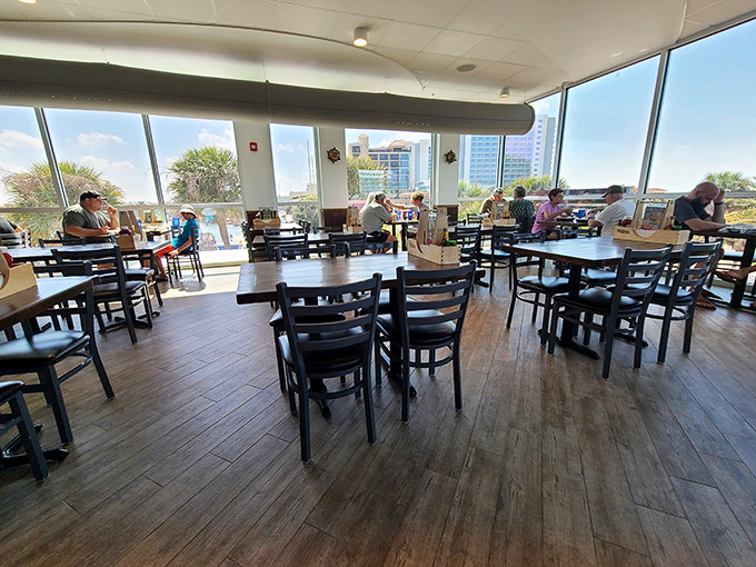 Floor-to-ceiling windows transform an ordinary lunch into a Clearwater spectacle. Even empty tables look like they're having a good time. 