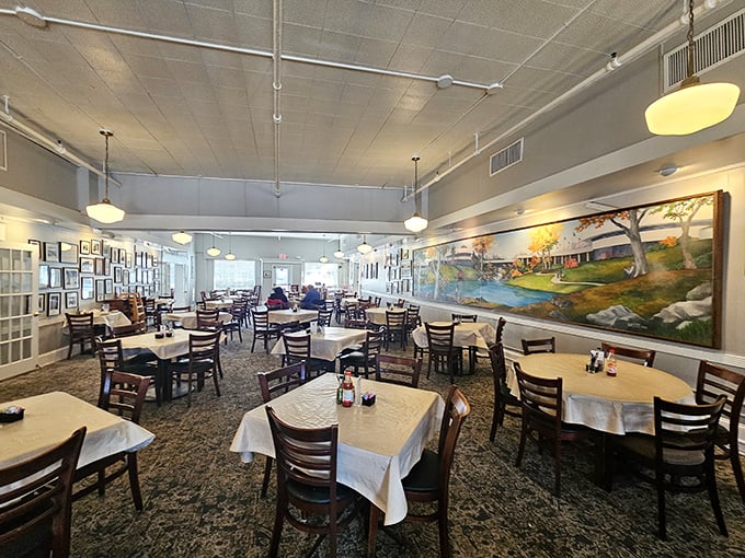 The dining room feels like a community gathering spot where strangers become friends over shared appreciation of perfectly seasoned collard greens.