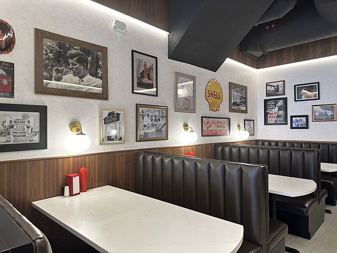 Black leather booths and vintage photographs create the perfect backdrop for the main event&mdash;your imminent food coma.