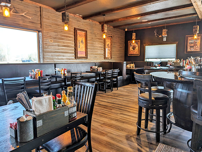 Wooden accents, barrel tables, and western-inspired d&eacute;cor create a dining room that feels like a modern-day saloon for breakfast enthusiasts. 