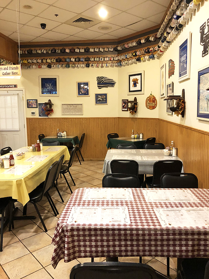 Red checkered tablecloths and patriotic decor create the perfect small-town diner atmosphere.