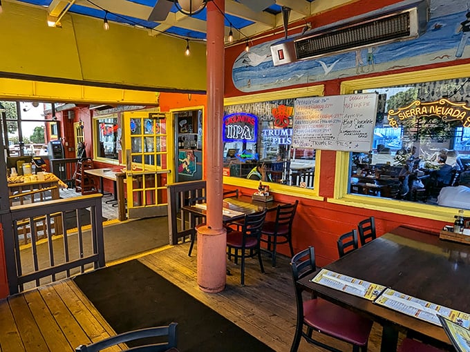 Sunshine yellow ceilings and vibrant walls make even foggy days feel cheerful. This dining room has hosted more happy seafood moments than a fisherman's diary.
