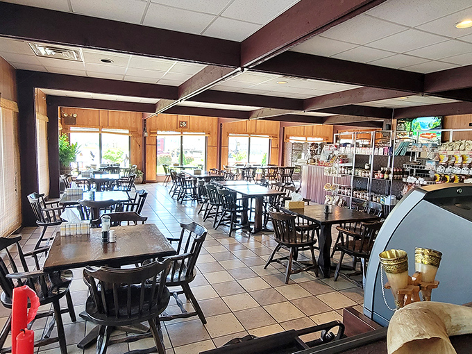 The dining room says "stay awhile" with its unpretentious charm. No designer lighting fixtures here&mdash;just honest space for honest food.