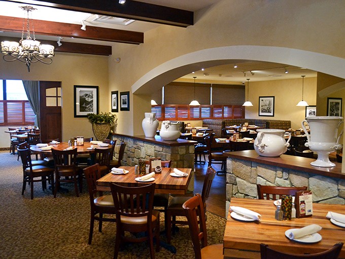 The dining room whispers "stay awhile" with its arched doorways and decorative urns&mdash;a stage set for the drama of deciding between tiramisu or cannoli.