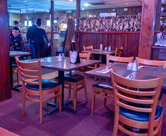 No designer lighting or trendy décor—just honest wood, comfortable seating, and an atmosphere that says "stay awhile, we've got plenty more food."