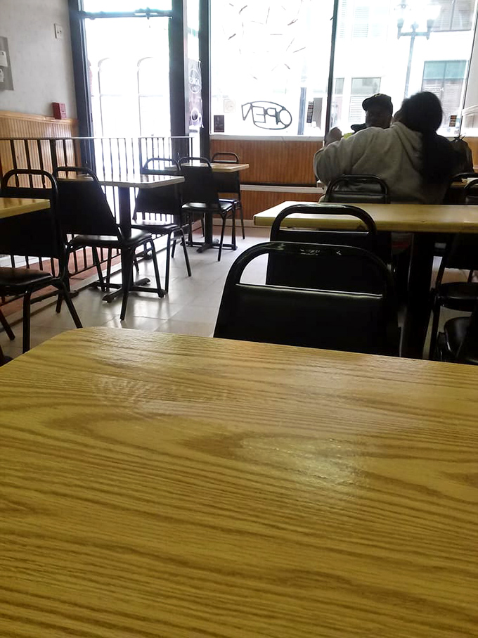 Simple wooden tables that have witnessed countless first bites, food epiphanies, and the silent nods that say "this was worth every penny."