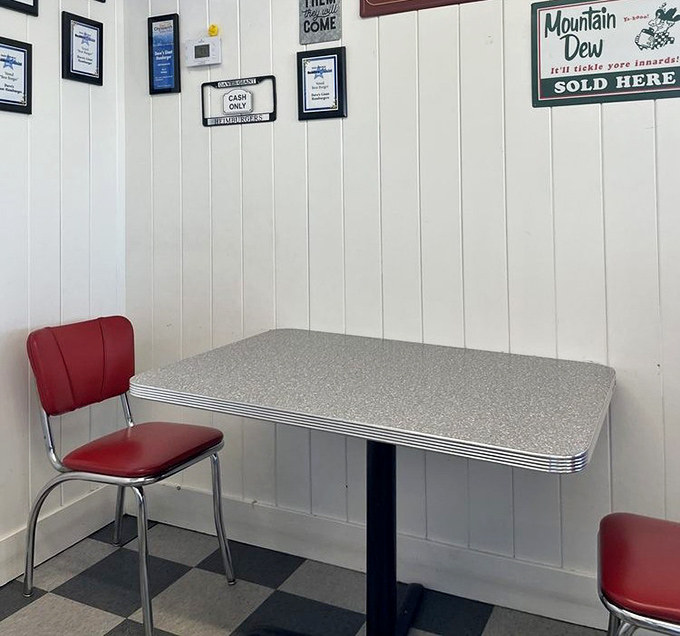 Retro dining perfection with chrome-trimmed tables and red vinyl chairs. Not designed by an Instagram influencer&mdash;just authentic since day one.