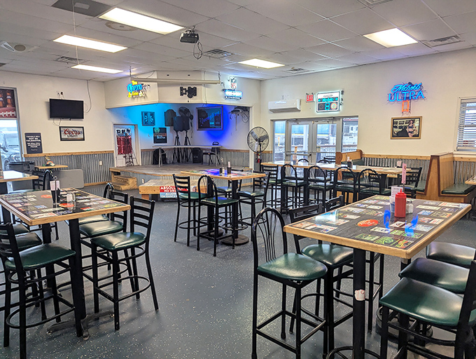 The dining area waits patiently for the dinner rush, tables set with the promise of hearty meals and the comfortable buzz of conversation.