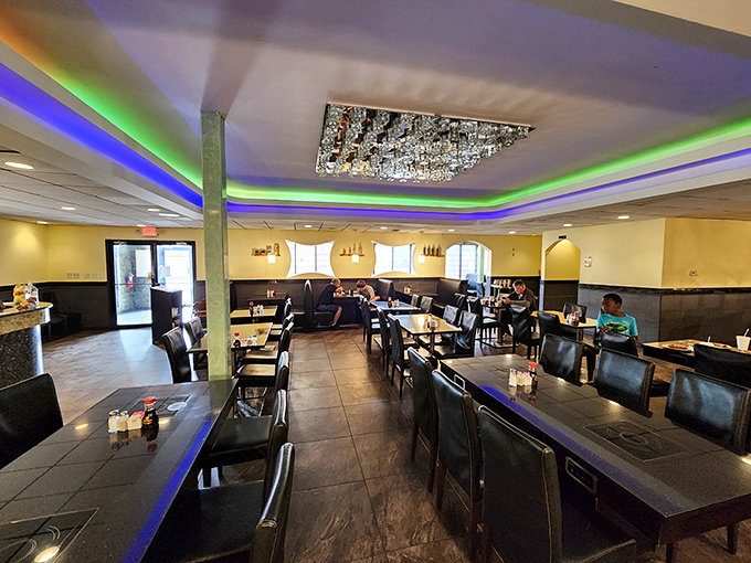 The dining room's blue LED lighting creates the perfect atmosphere for what can only be described as underwater feasting.