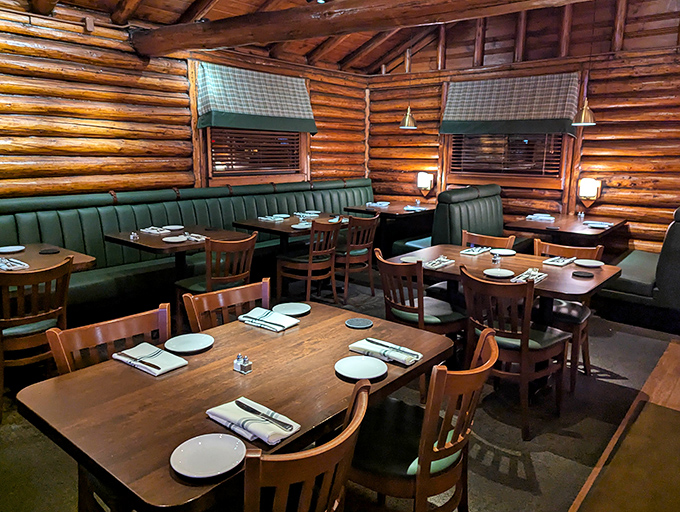 Log walls create dining nooks that feel both intimate and communal. It's like eating in a luxury ski lodge, minus the sore muscles and wet socks.