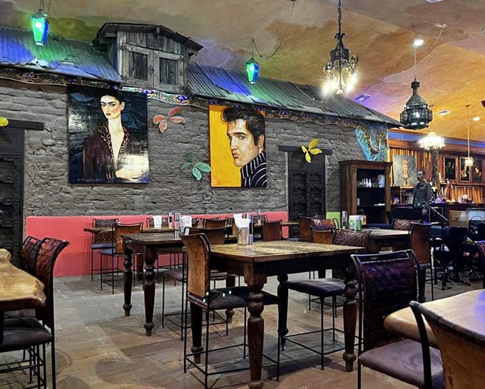 The dining room feels like stepping into Frida Kahlo's imagination&mdash;bold portraits, stone walls, and lighting that flatters both the food and you.