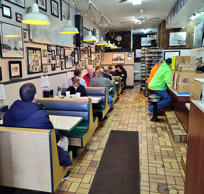 Where strangers become regulars and regulars become family. The narrow dining room buzzes with conversation and the promise of good food.