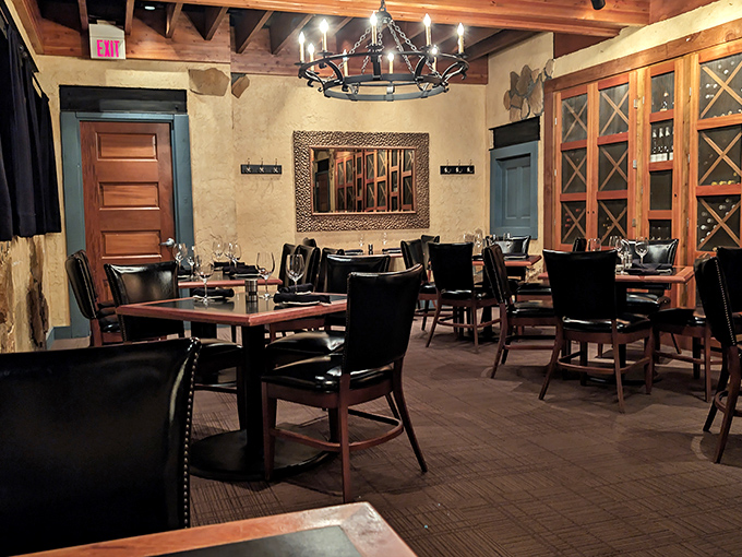 The private dining area whispers "special occasion" with its rustic elegance, wine display, and lighting that makes everyone look ten years younger.