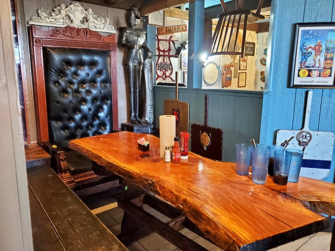 Medieval meets modern in this dining nook. That tufted throne and live-edge table say, "Yes, you can feel like royalty while eating pancakes."
