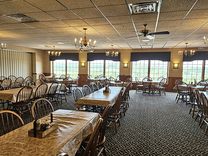 Empty tables that won't stay that way for long. The chandeliers add a touch of elegance to what's about to become a delicious battleground.