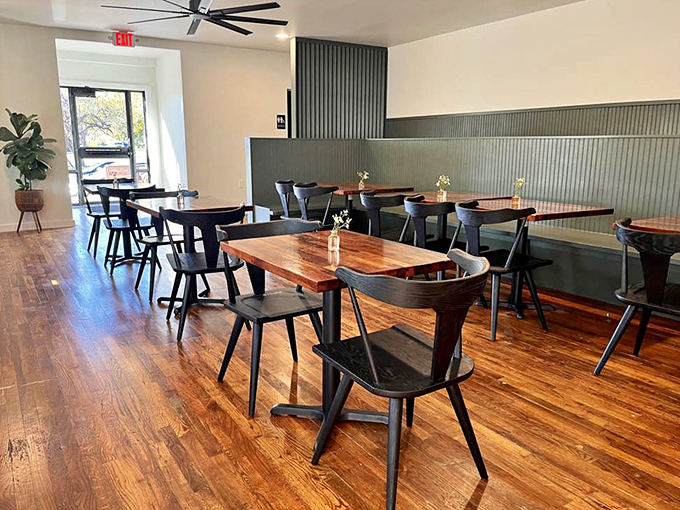 Modern meets rustic in this dining space where the only thing more polished than the wood floors is the barbecue technique.