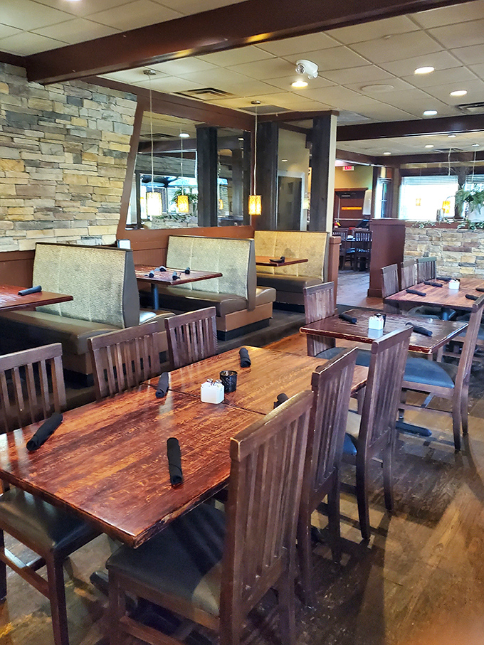 Stone walls and wooden tables create that perfect balance between rustic charm and modern comfort where memories are made one meal at a time.