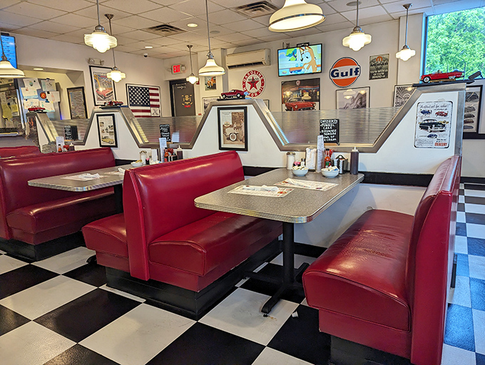 Red vinyl booths and vintage memorabilia create an atmosphere where every meal feels like a celebration of comfort.