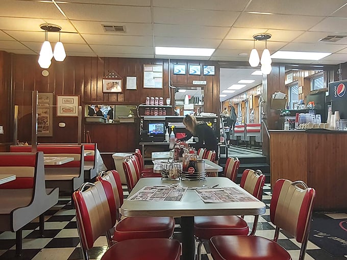 Red vinyl booths and formica tables&mdash;the natural habitat of great diner food. Notice how the wood paneling radiates decades of satisfied sighs.