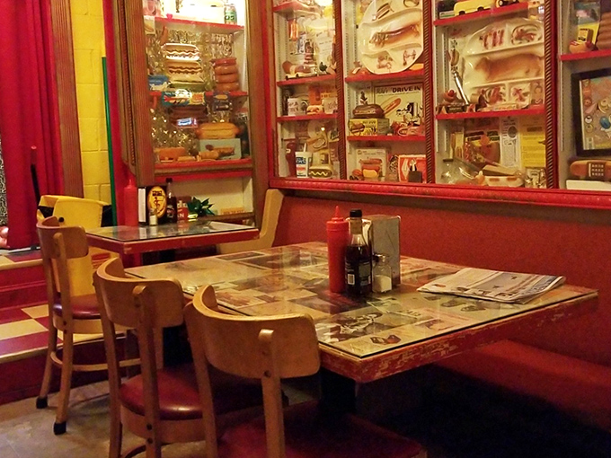 The dining area feels like a hot dog museum where you can eat the exhibits, with display cases full of frankfurter memorabilia.
